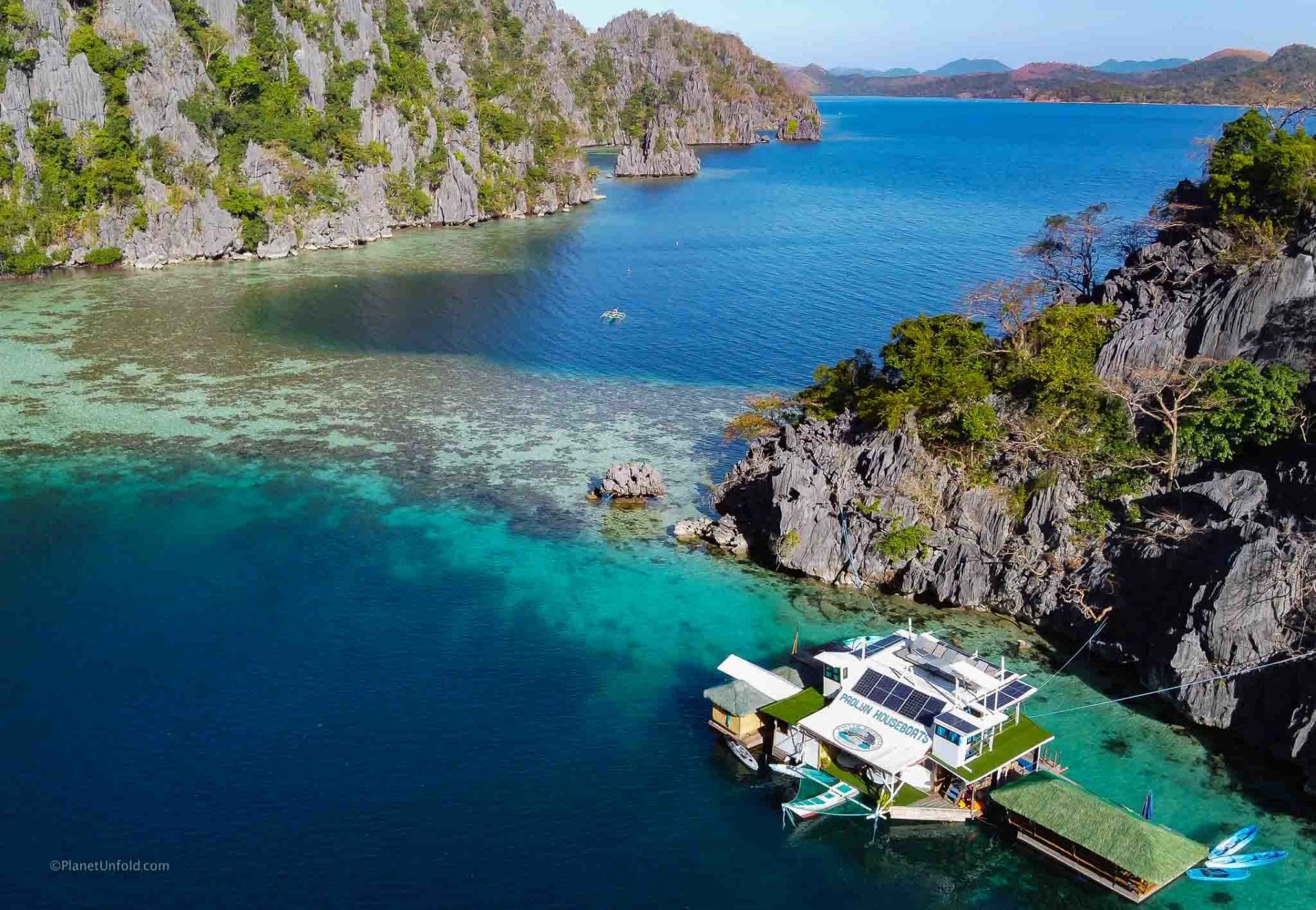 An Epic Coron Island Houseboat Stay | Planet Unfold